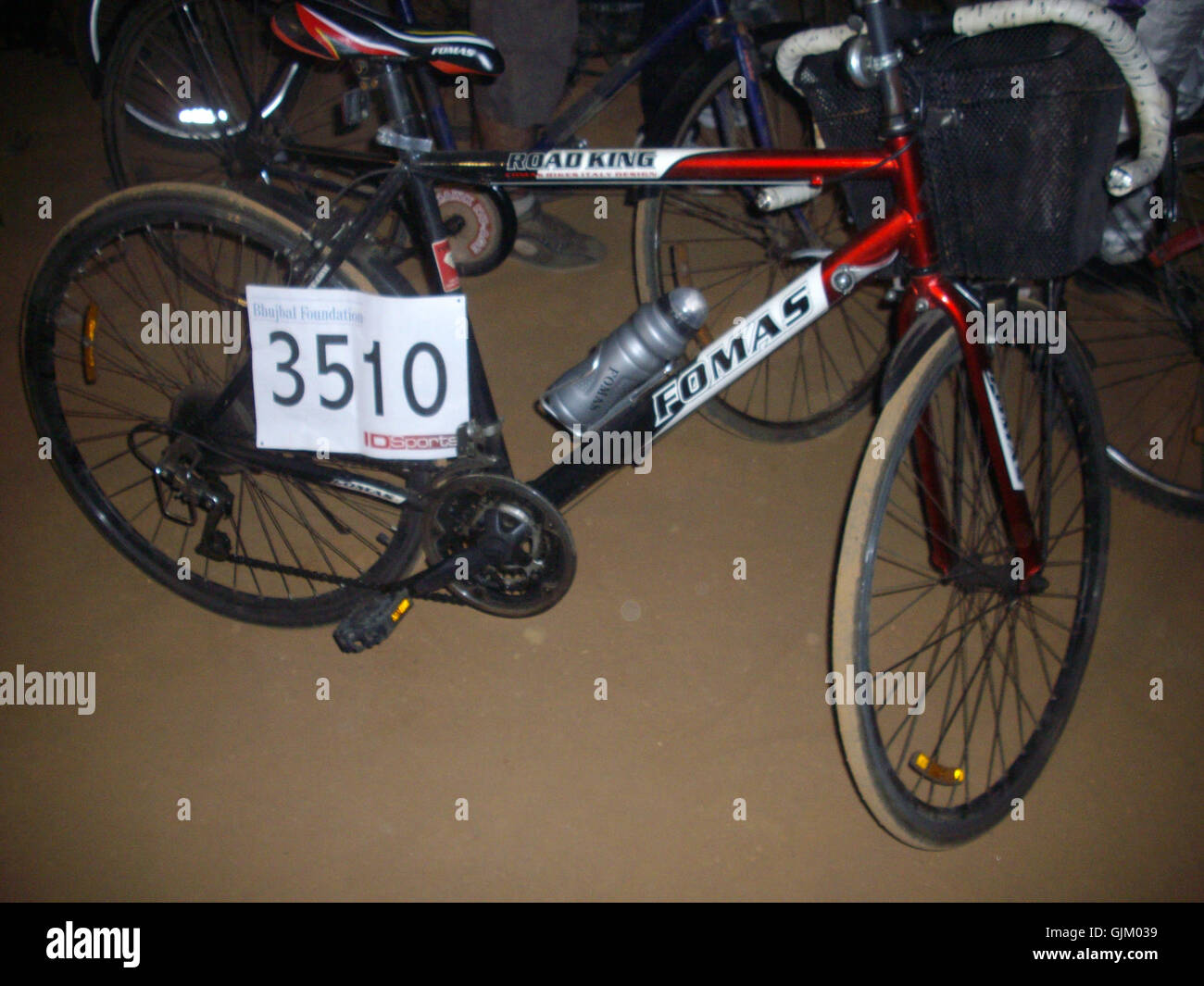This image shows the 'Fomas Road King' cycle and the competitor number ...