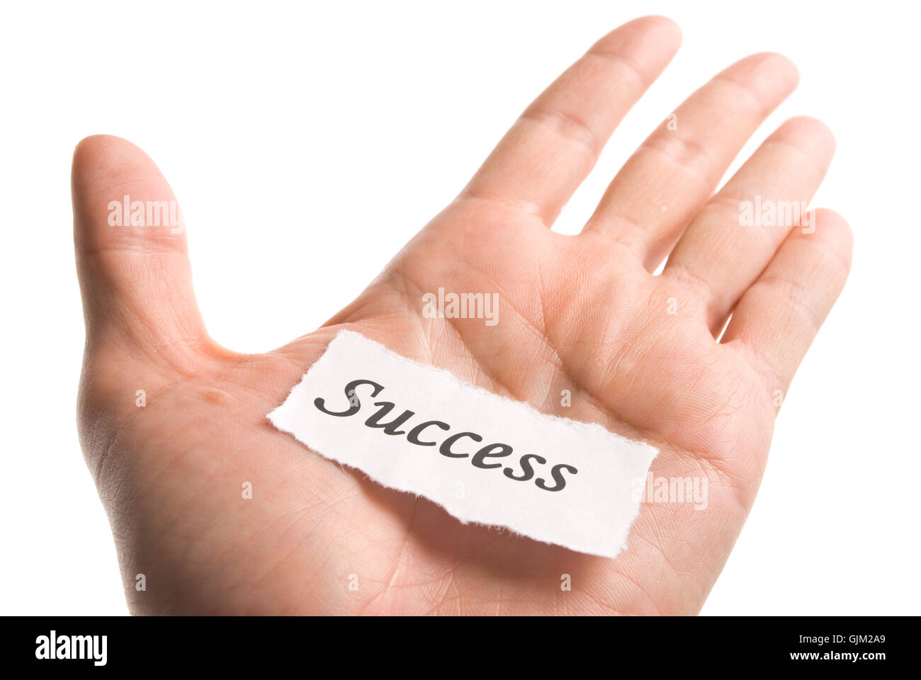 Success word in hand Stock Photo - Alamy
