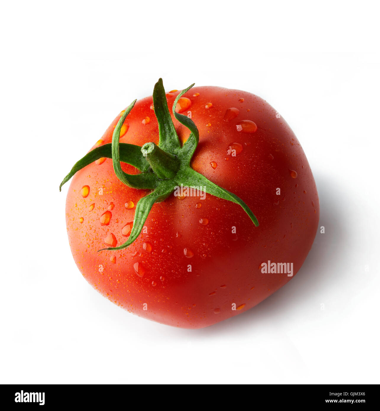 Tomato with drops Stock Photo - Alamy