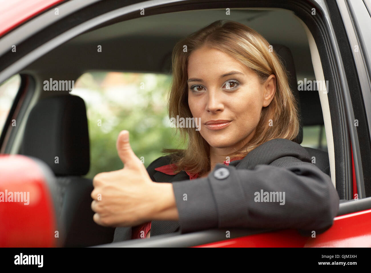 woman drive indicate Stock Photo - Alamy