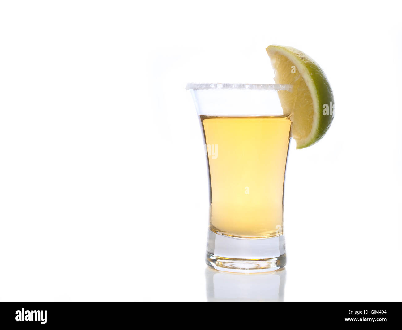 Tequila in a shot glass Stock Photo - Alamy