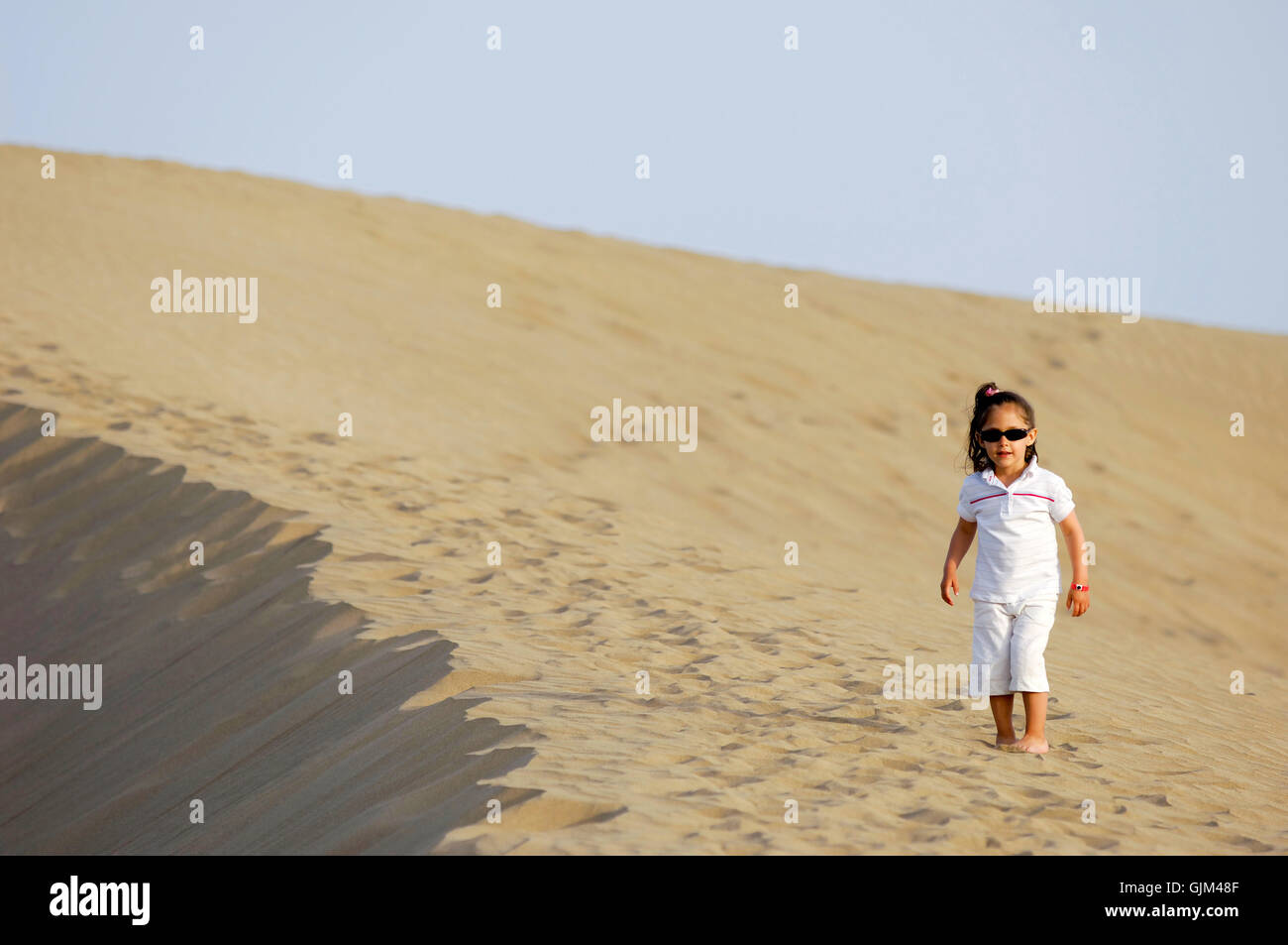 Child in desert Stock Photo - Alamy