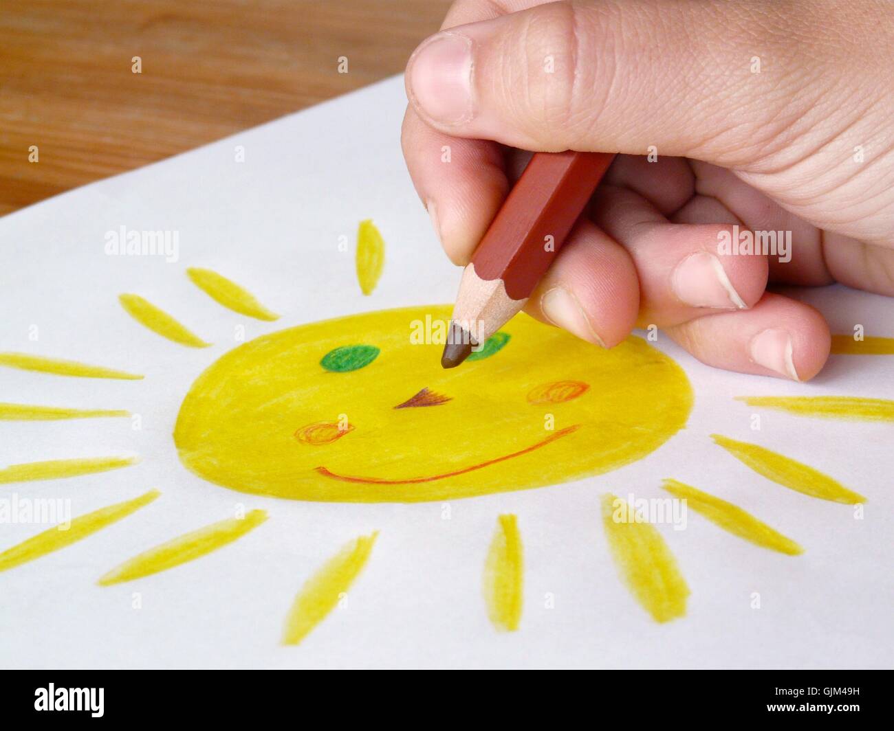 Brown child hand crayon hi-res stock photography and images - Alamy