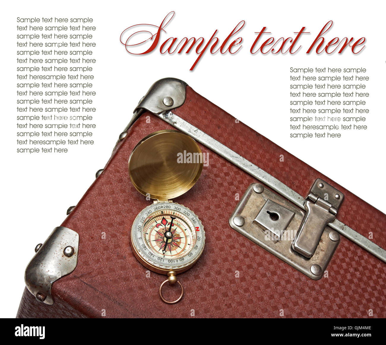old suitcase with a compass Stock Photo - Alamy