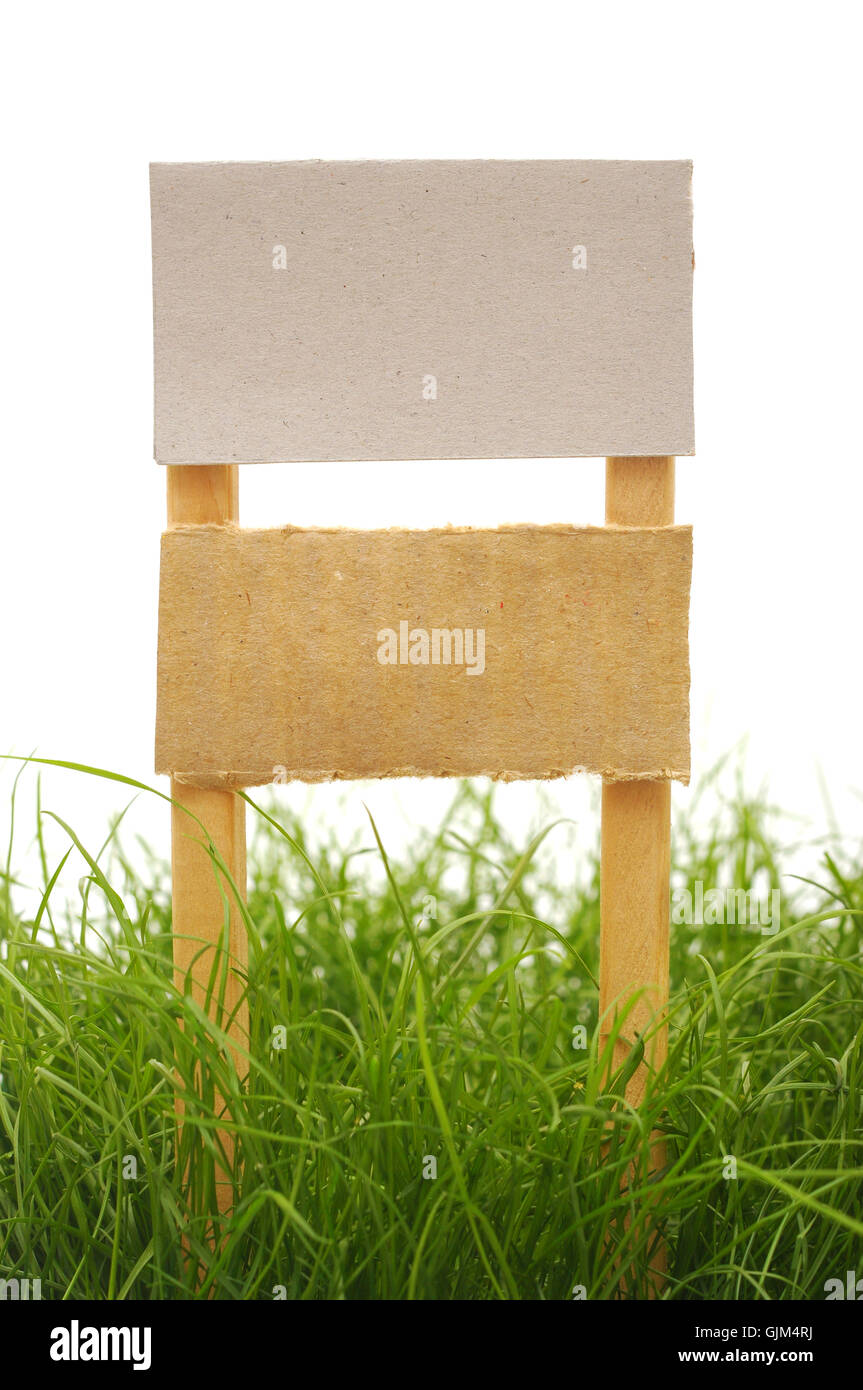 cardboard sign with grass isolated on a white background Stock Photo ...