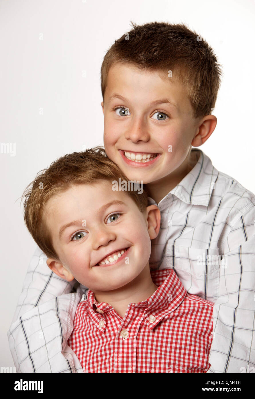 two young boys smilling Stock Photo - Alamy