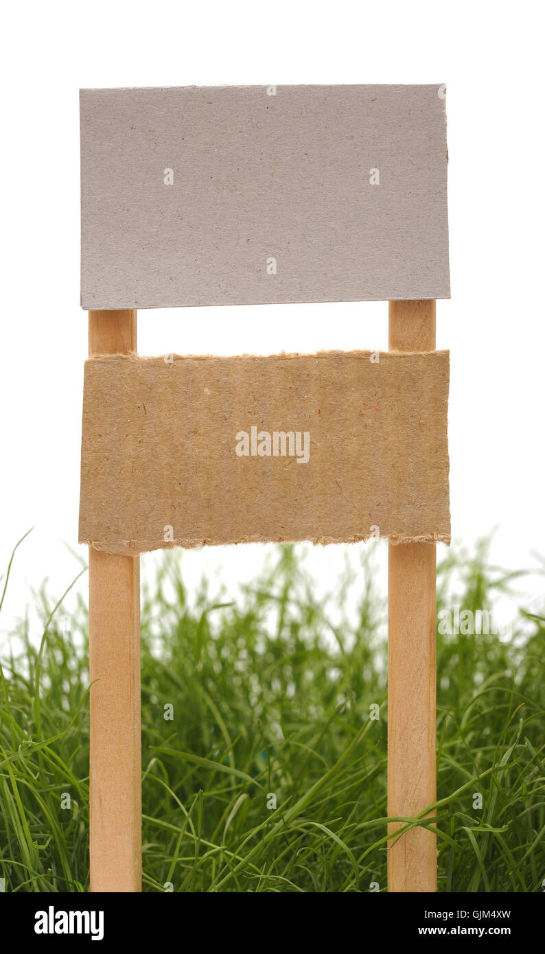 cardboard sign with grass isolated on a white background Stock Photo ...