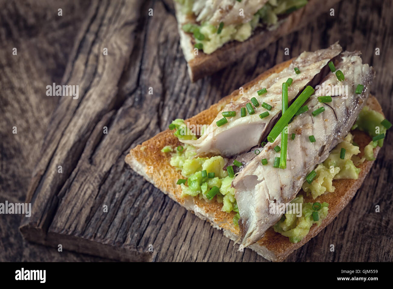Sandwich with fish and avocado Stock Photo - Alamy