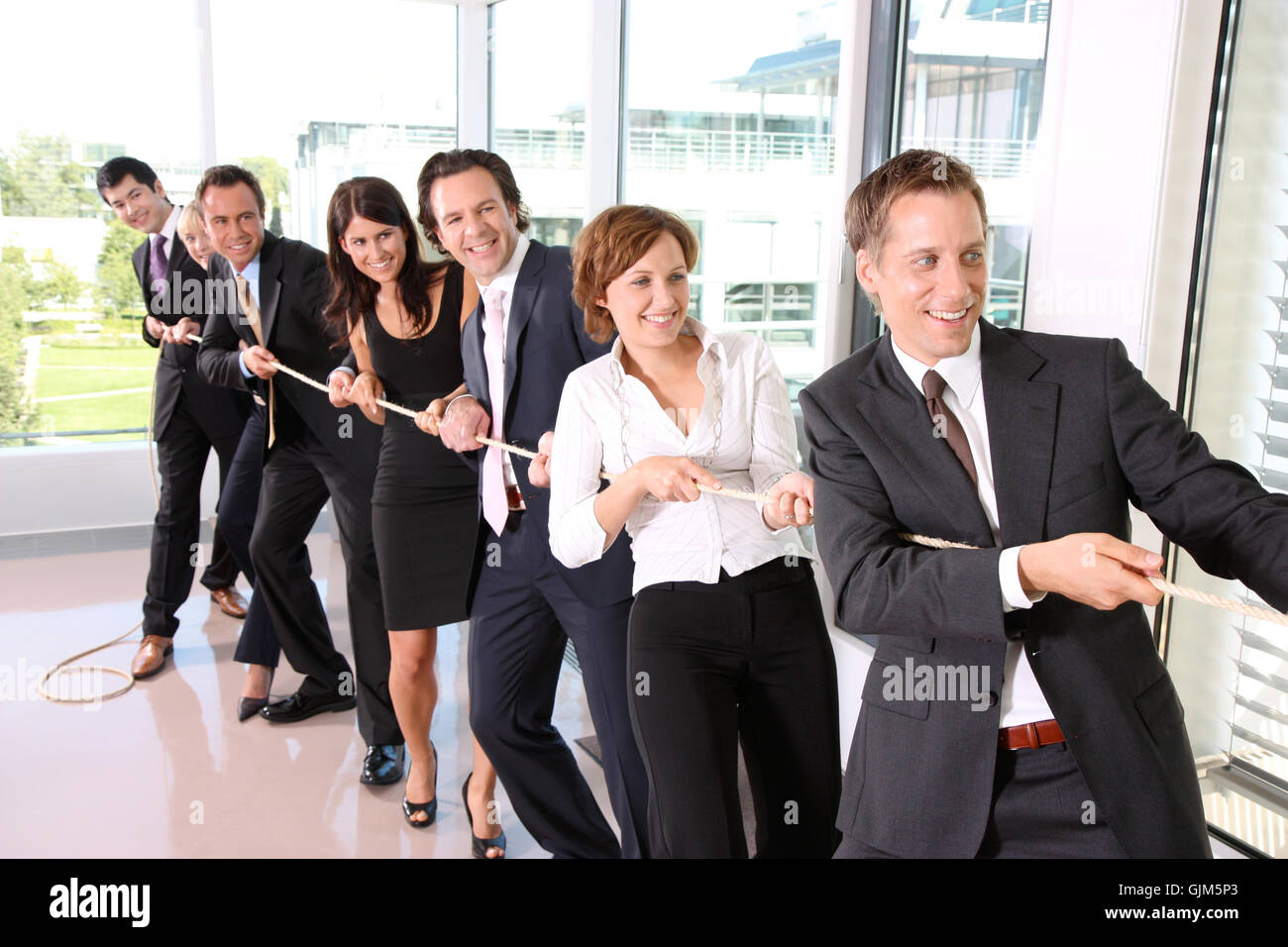 Community pull together hi-res stock photography and images - Alamy