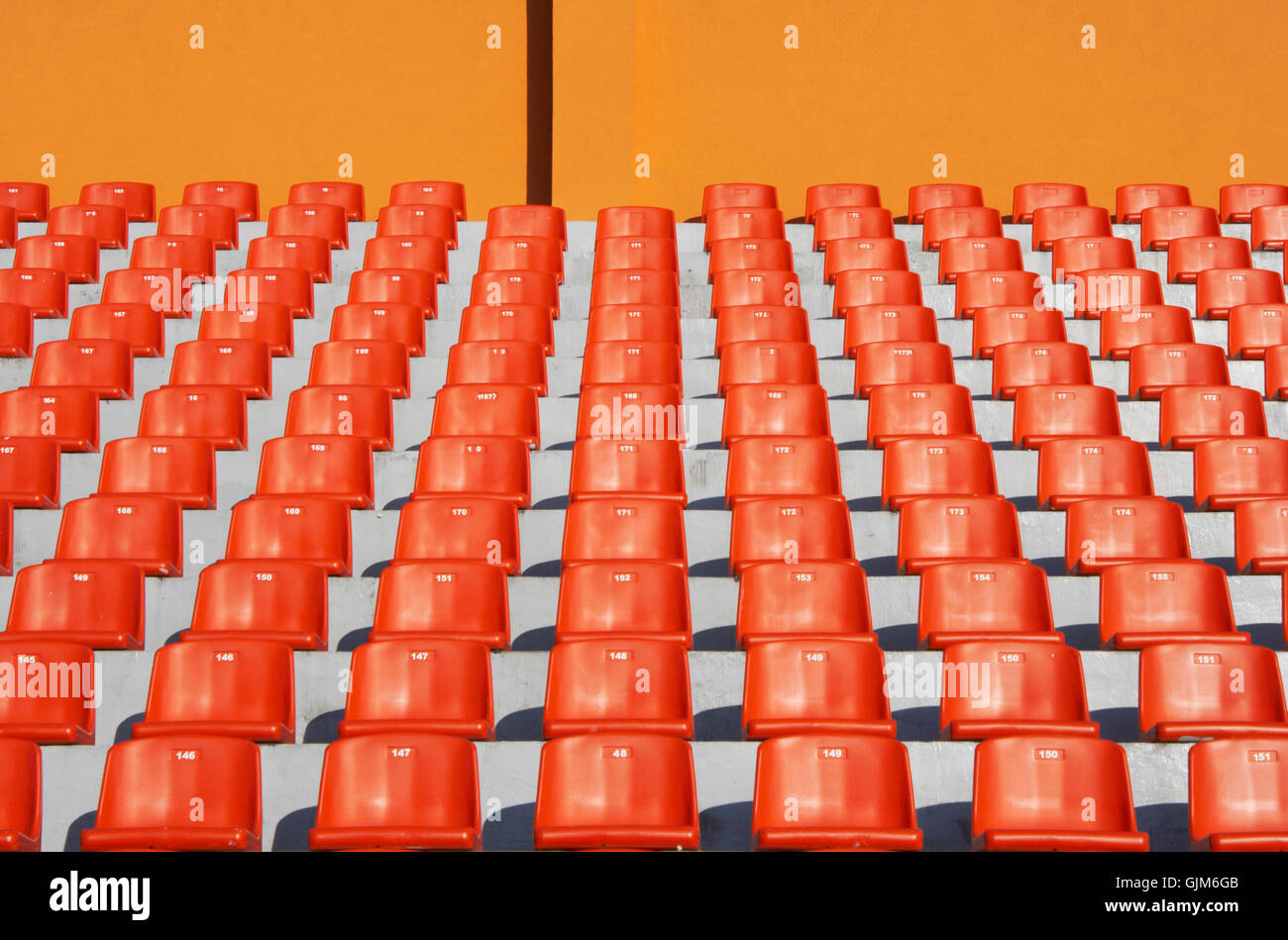Red stadium seats Stock Photo - Alamy