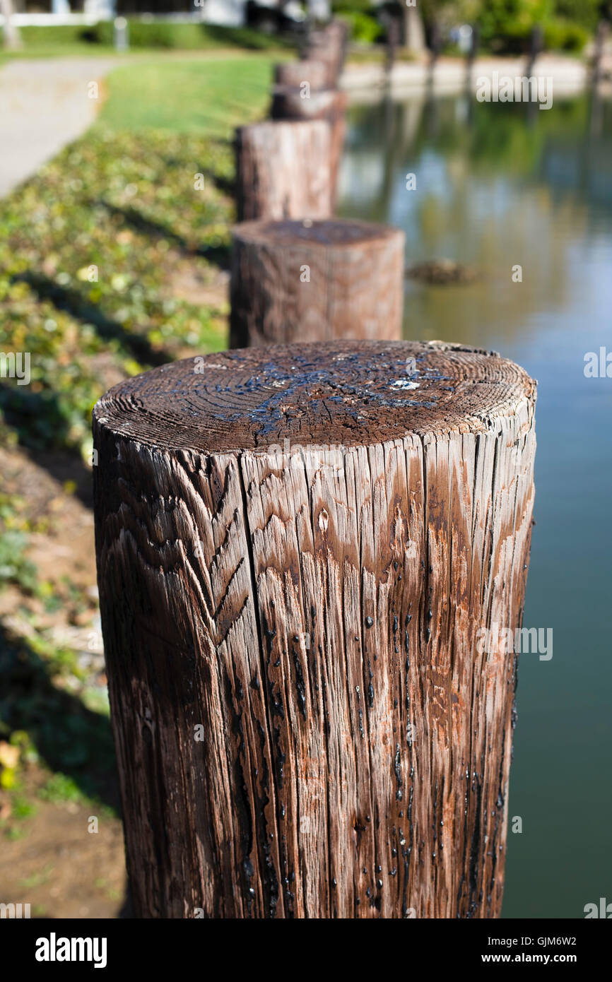 Wood Post By Lake Stock Photo - Alamy