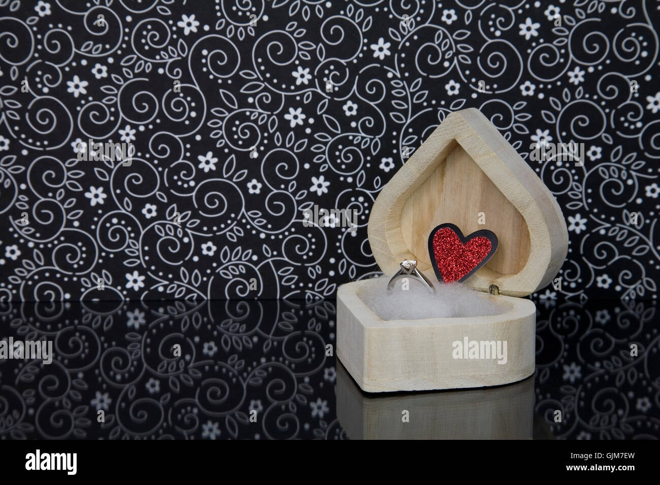 Diamond Engagement Ring in a heart Shaped wooden box Stock Photo - Alamy