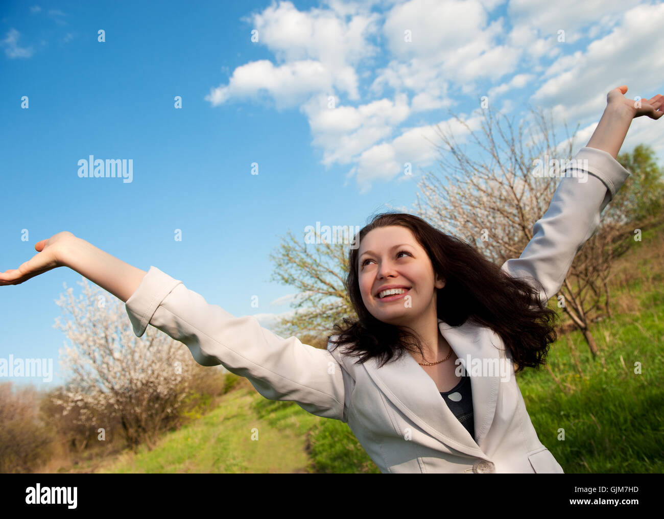 Female hands lifted blue hi-res stock photography and images - Alamy