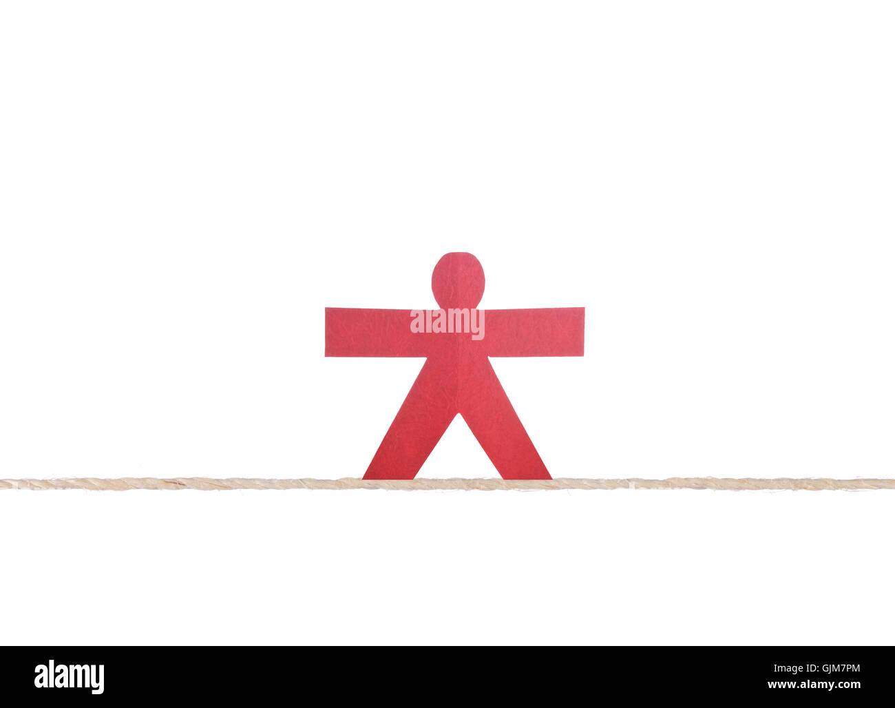 Colorful paper dolls standing on single rope Stock Photo - Alamy
