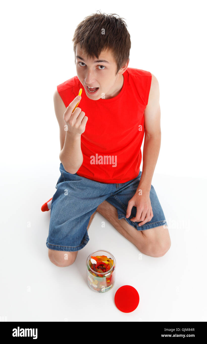 Child eating snakes confectionery Stock Photo - Alamy