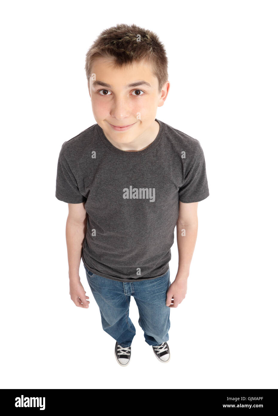 Teen boy standing white background Cut Out Stock Images & Pictures - Alamy