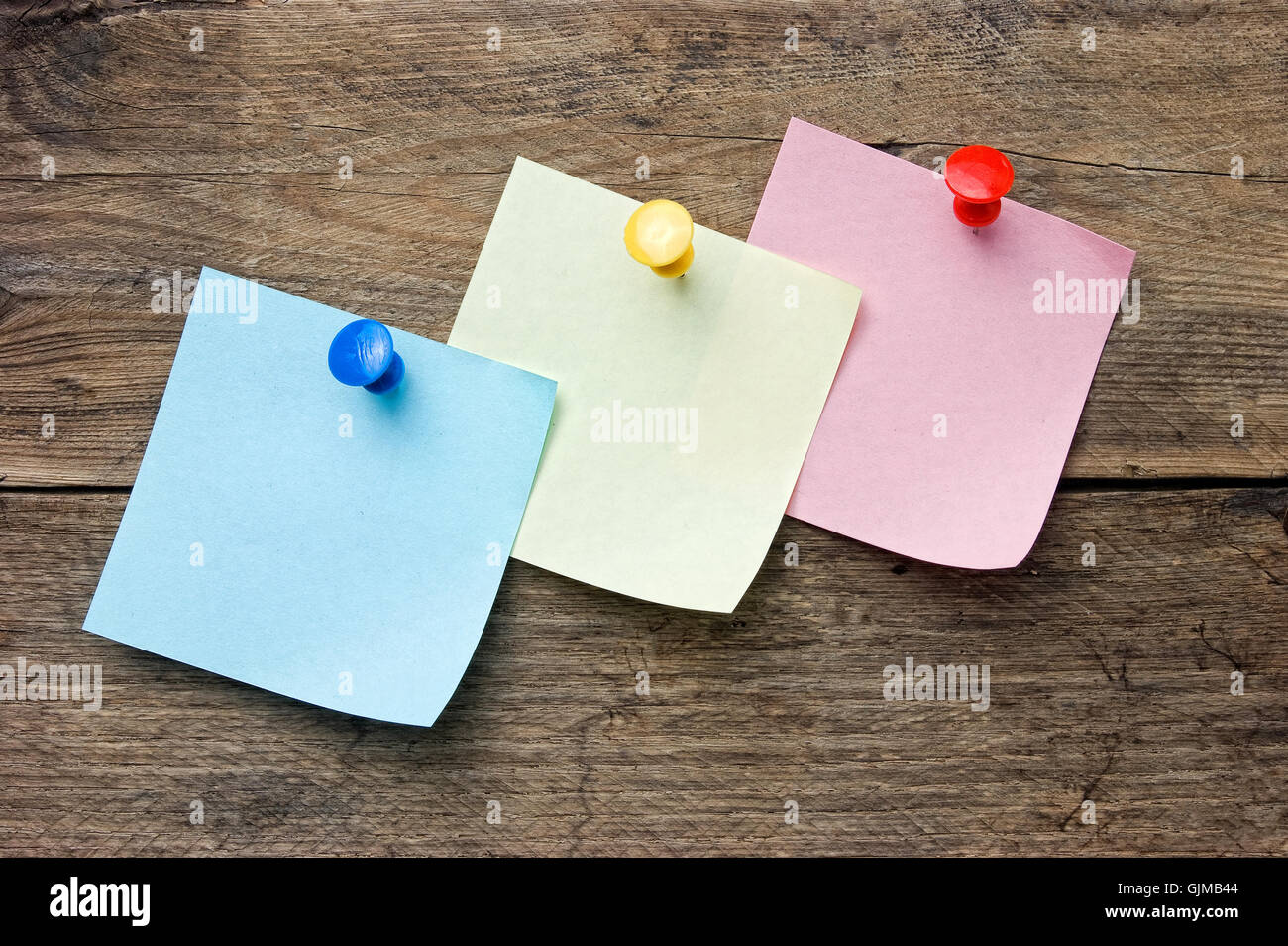 A piece of paper pinned the button Stock Photo - Alamy