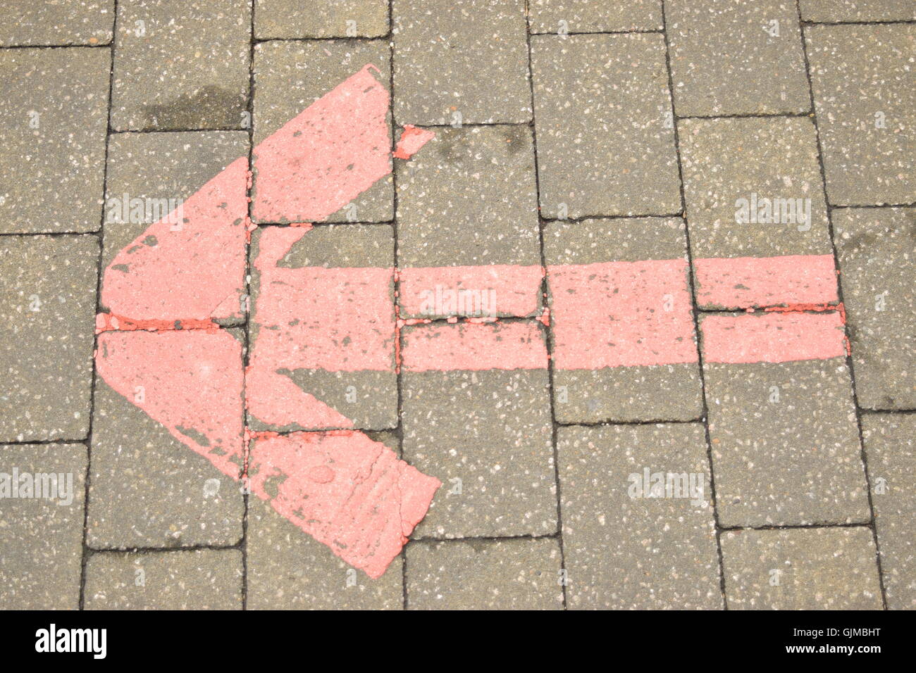 Red Arrow Sign Pointing Left Stock Photo - Alamy