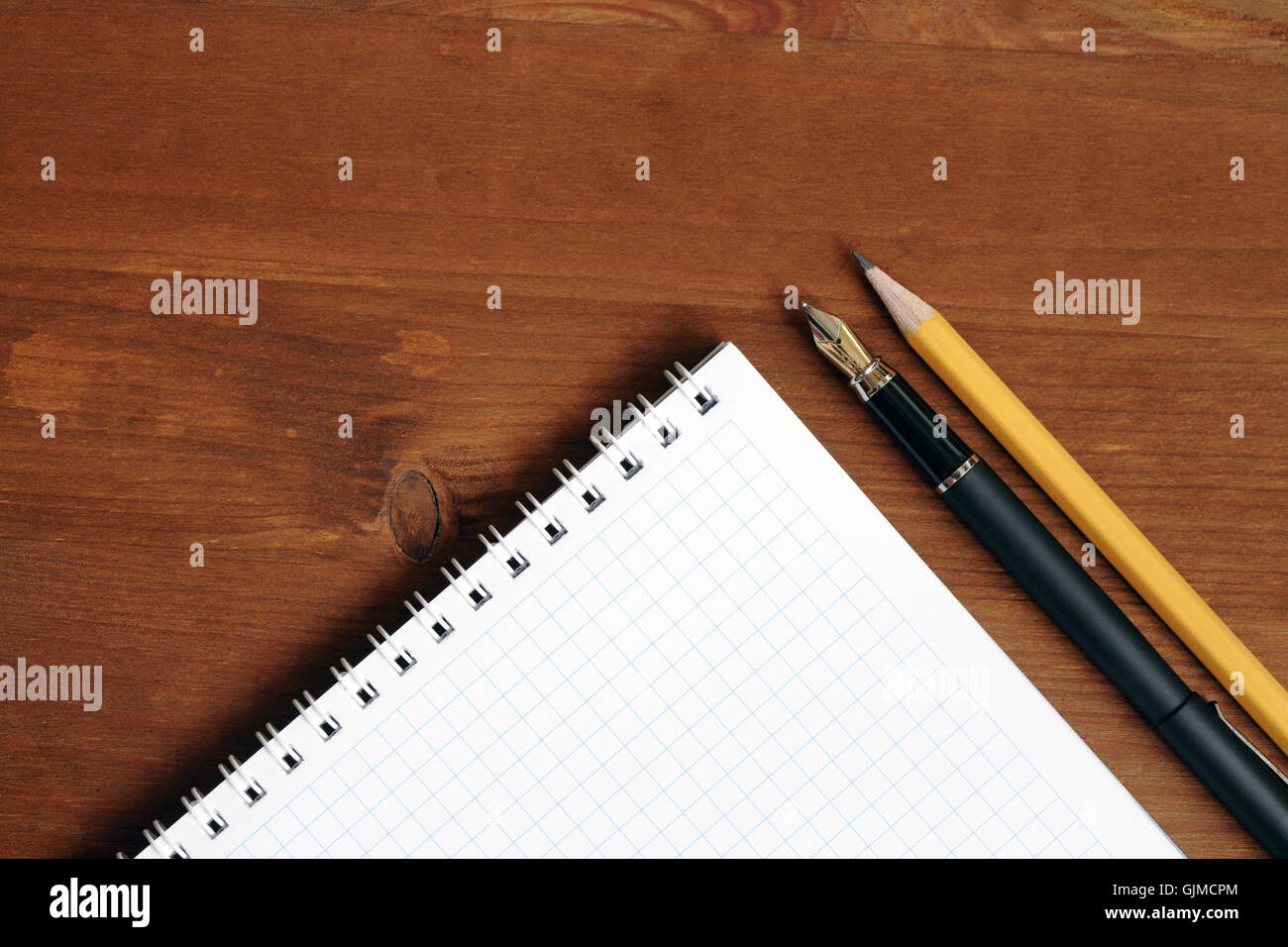 Spiral Notebook On The Table Stock Photo - Alamy