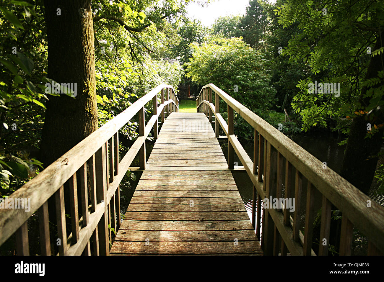 bridge over the creek Stock Photo - Alamy