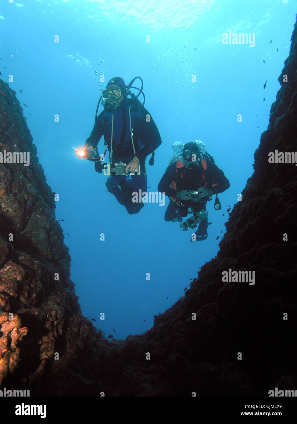 divers before the cave entrance Stock Photo - Alamy