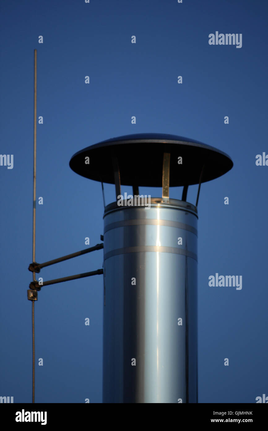 high-grade steel metal chimney Stock Photo - Alamy