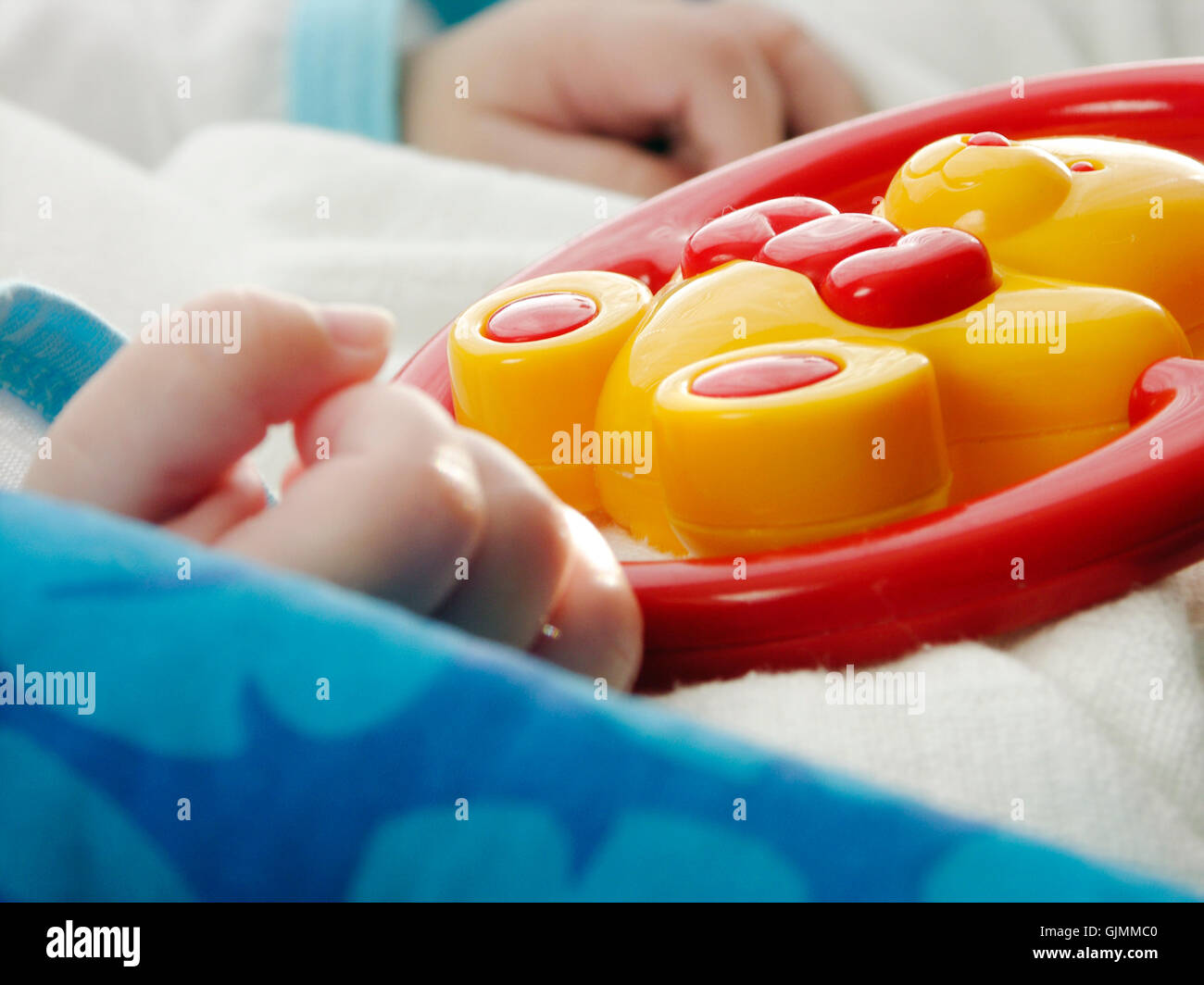 Baby hand toy hi-res stock photography and images - Alamy