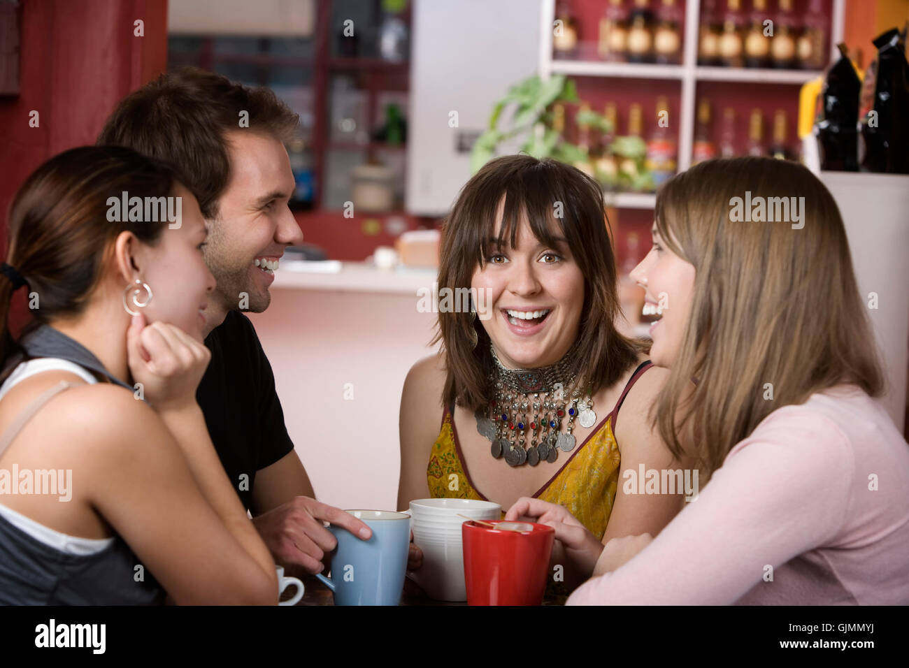 Beautiful young hispanic woman speaks hi-res stock photography and ...