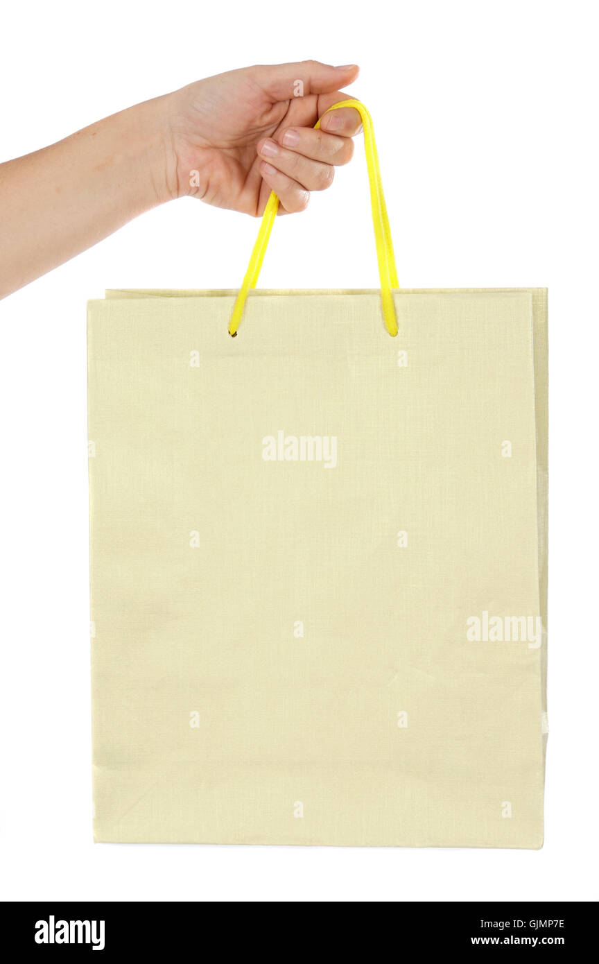 Yellow christmas paper shopping bag Cut Out Stock Images & Pictures - Alamy