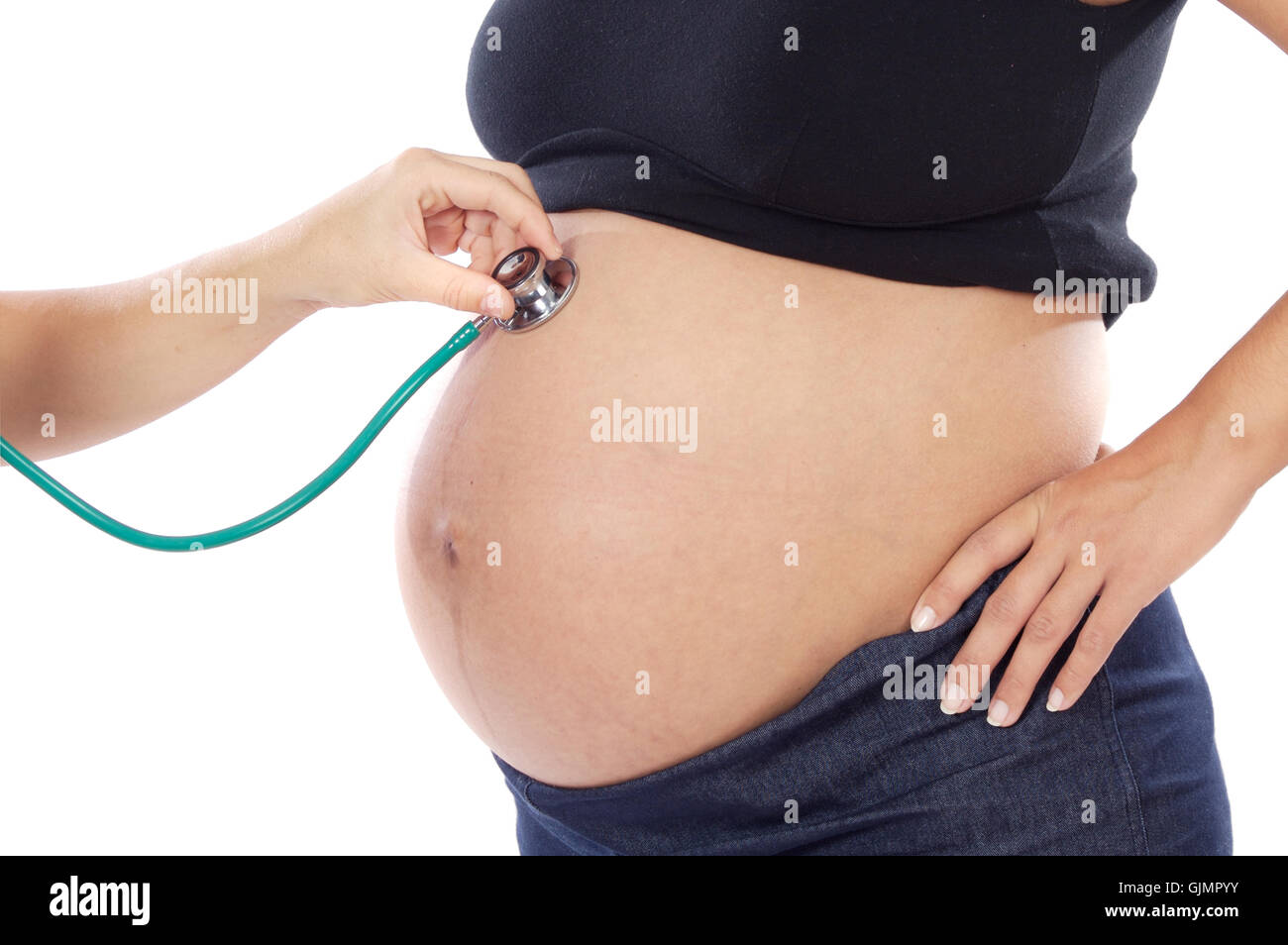 Doctor examine pregnant belly in hi-res stock photography and images ...