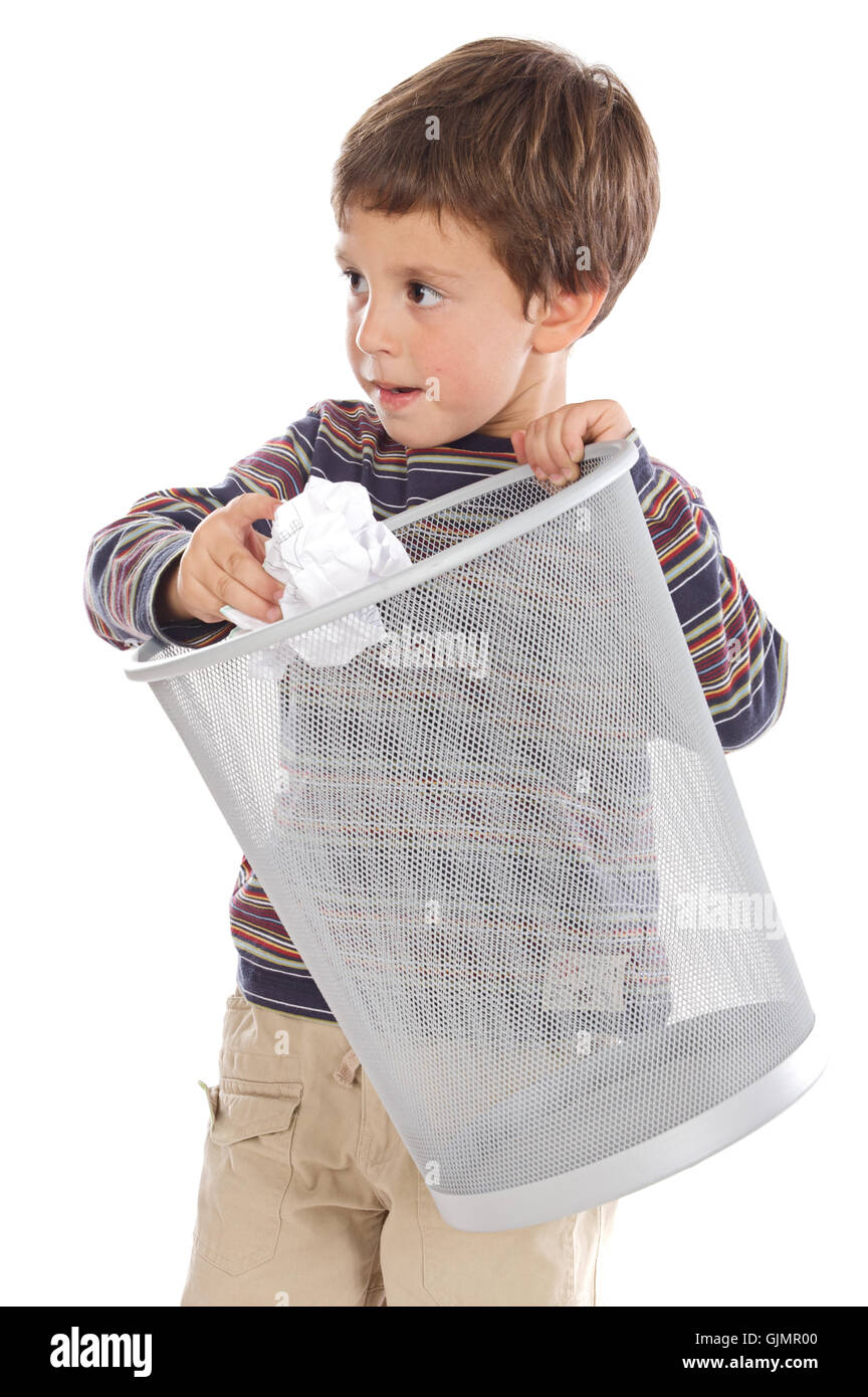 Boy throwing garbage into trash can hi-res stock photography and images ...