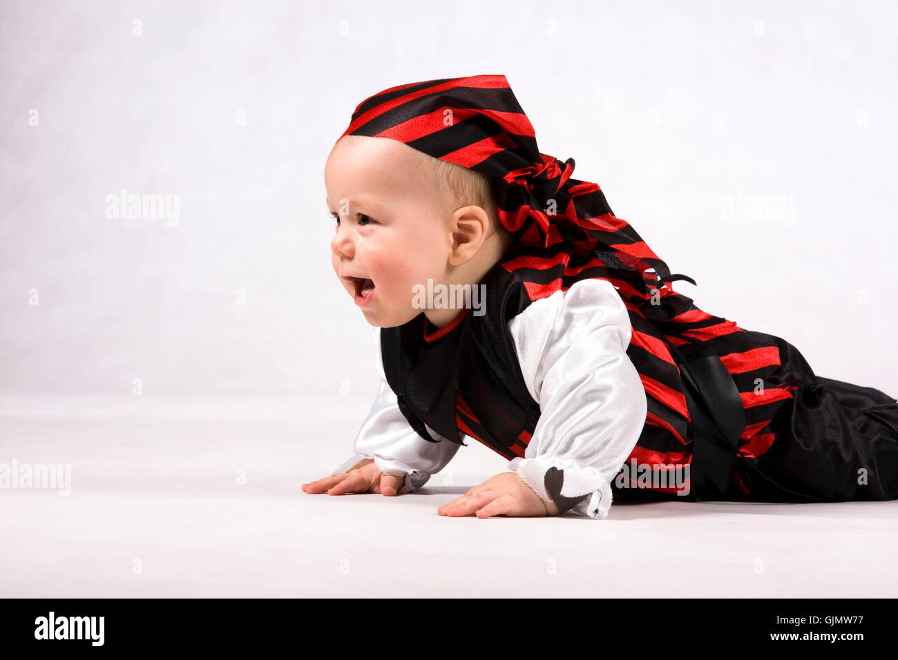 child as a pirate on the look Stock Photo - Alamy