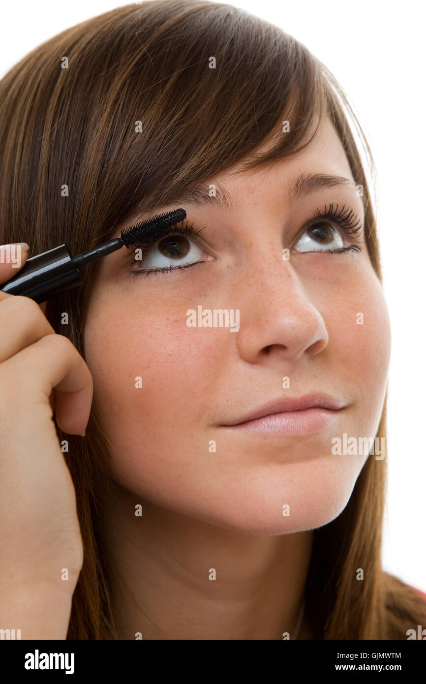 portrait teenager applying makeup Stock Photo - Alamy
