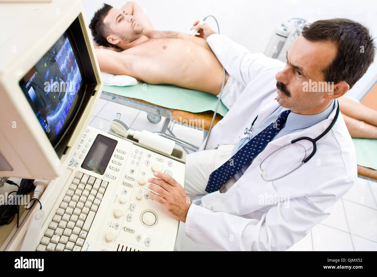 Portrait professional ultrasound doctor working hi-res stock ...