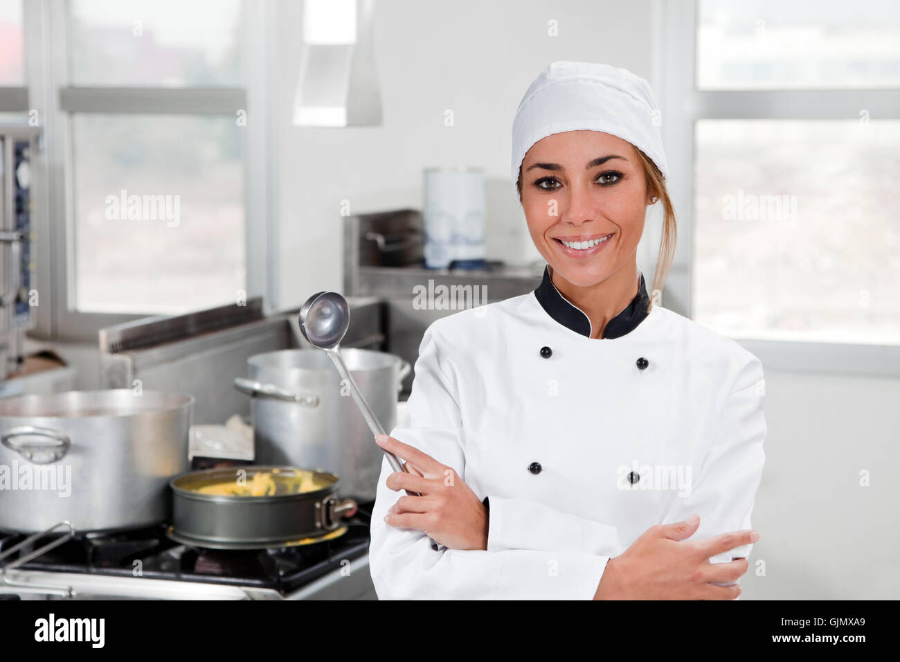 woman restaurant kitchen Stock Photo - Alamy