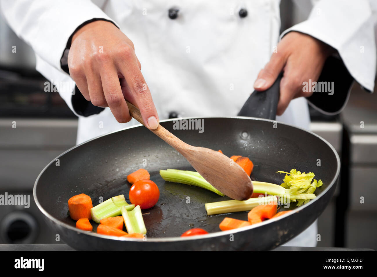 Cooks working in restaurant hi-res stock photography and images - Alamy