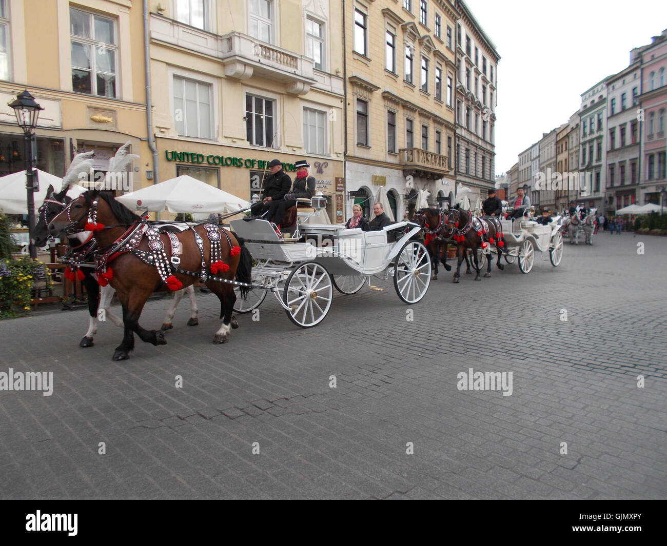 A depiction of various horse-drawn carriages, showcasing transportation ...