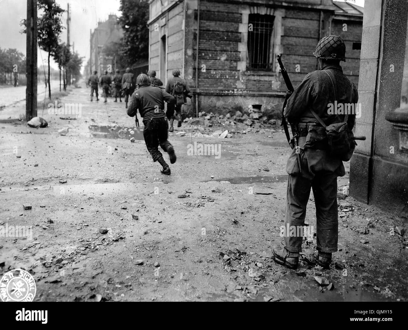A 1944 military photograph depicting combat in Cherbourg, France ...