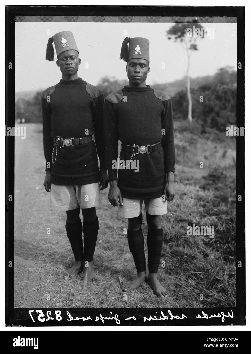 This photograph from 1936 shows two Ugandan soldiers in uniform ...