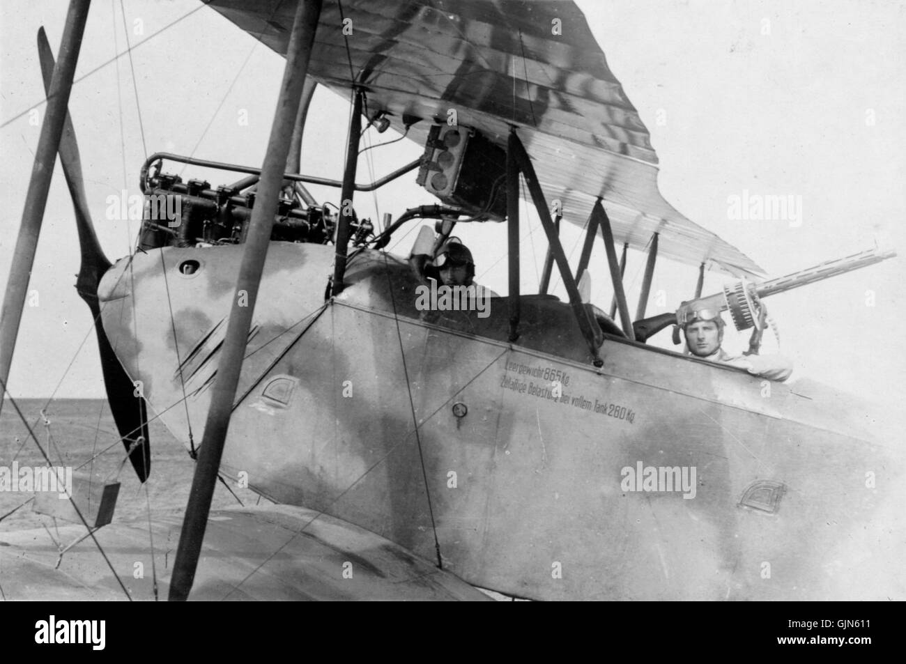 This photograph shows the crew of a German AEG C.IV aircraft in ...