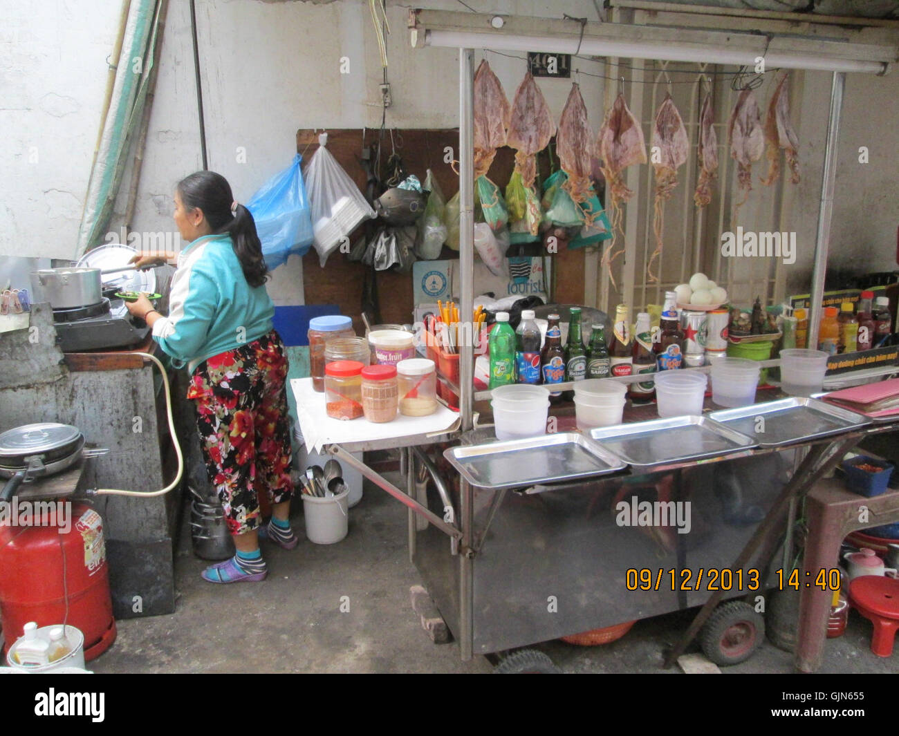 This image shows a street-side restaurant, a popular setting in many ...