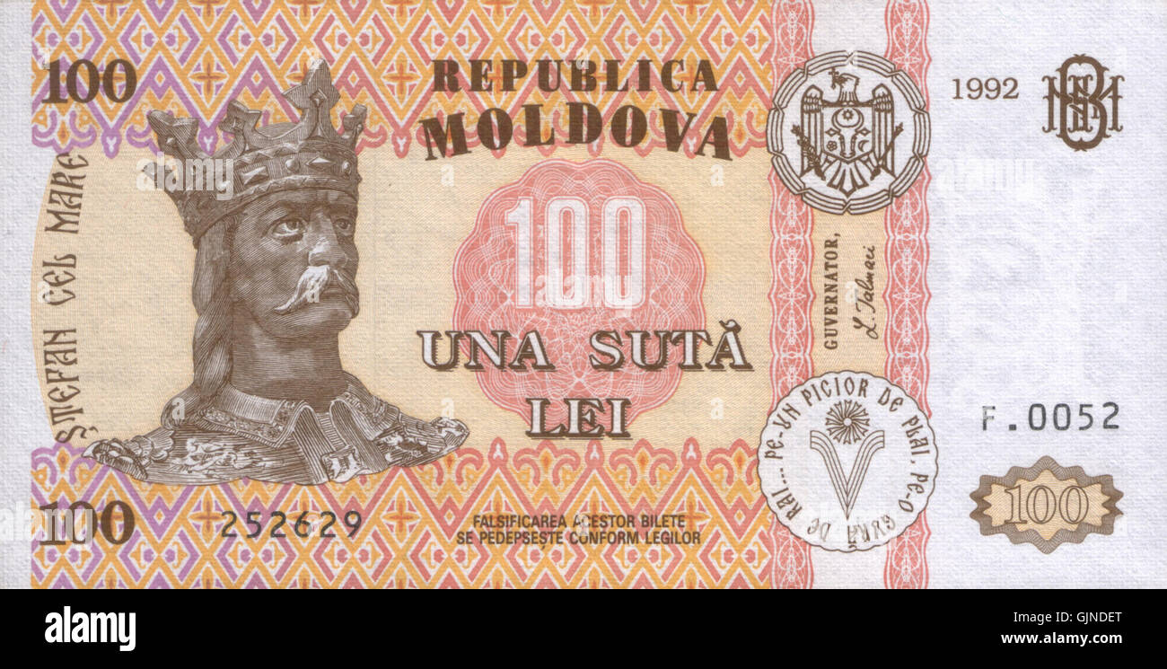 A 100 Lei banknote from Moldova, featuring intricate designs and ...