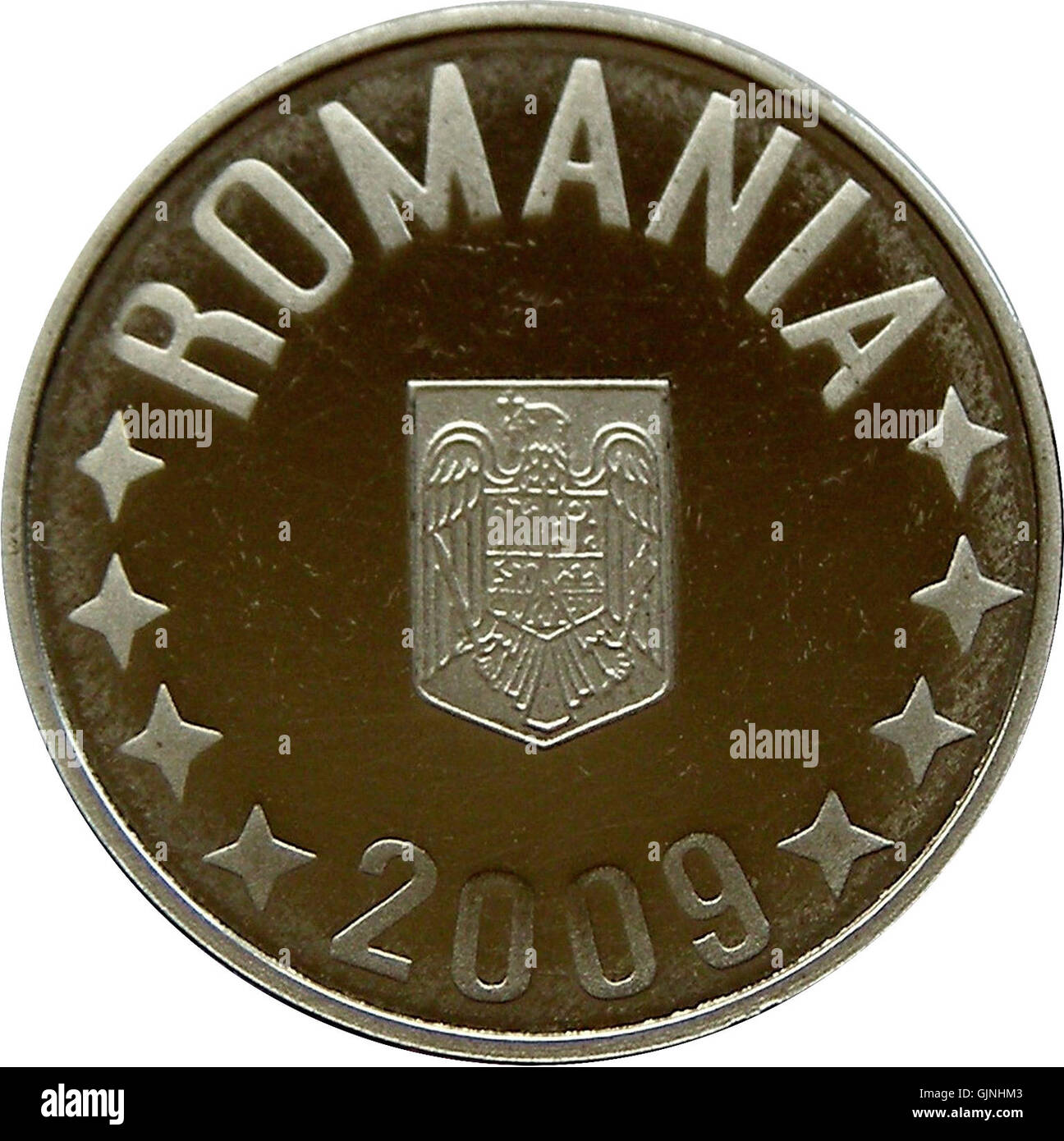 This coin, marked RO 2009 10bani b, is a Romanian 10 bani coin, issued ...