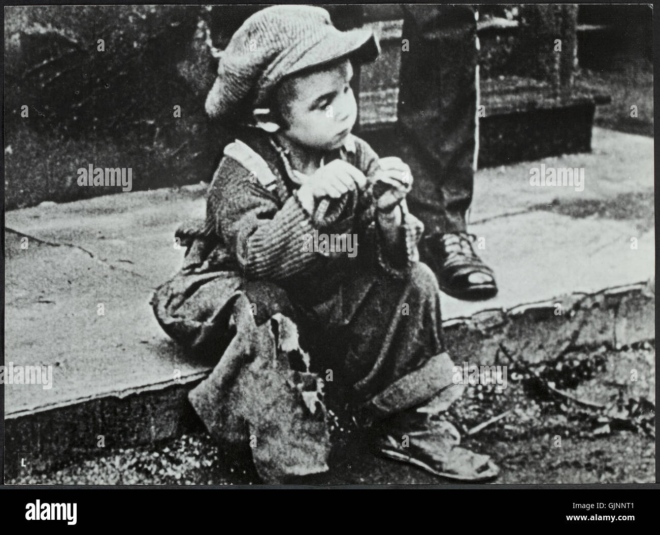 A still image from Charles Chaplin's 1921 film 'The Kid,' capturing a ...