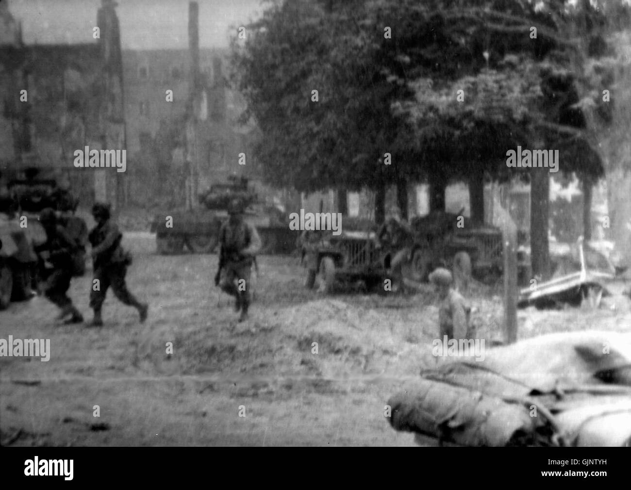 Photograph depicting US soldiers searching for shelter during a ...