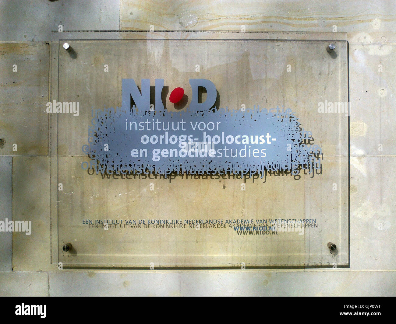 A photograph of the NIOD sign in Amsterdam, located at Herengracht 380 ...