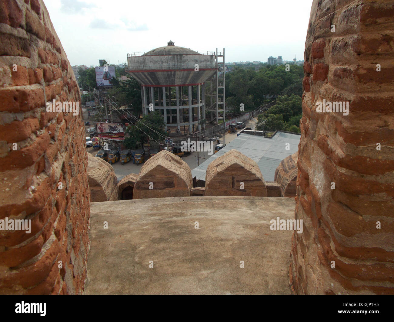 This image depicts the water tank located behind Kondareddy Fort, a ...