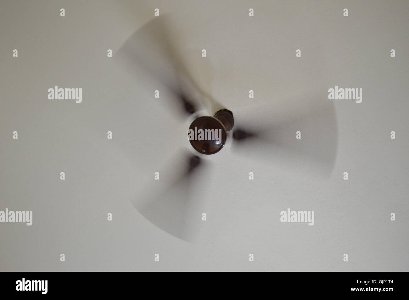 This photograph captures the motion of a rotating ceiling fan at a 40th of a second exposure ...