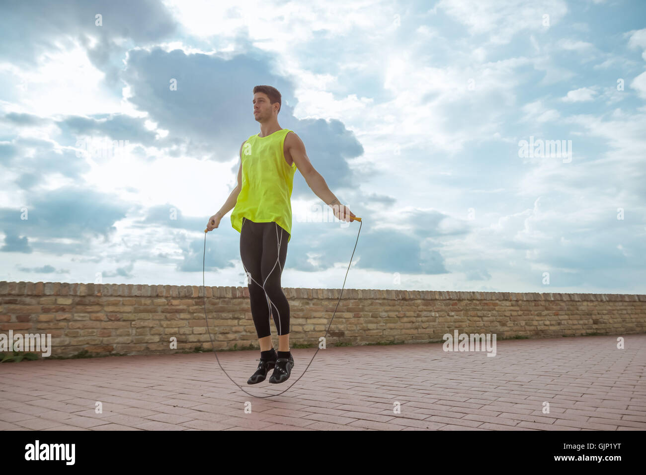 Fitness man jumping rope hi-res stock photography and images - Alamy