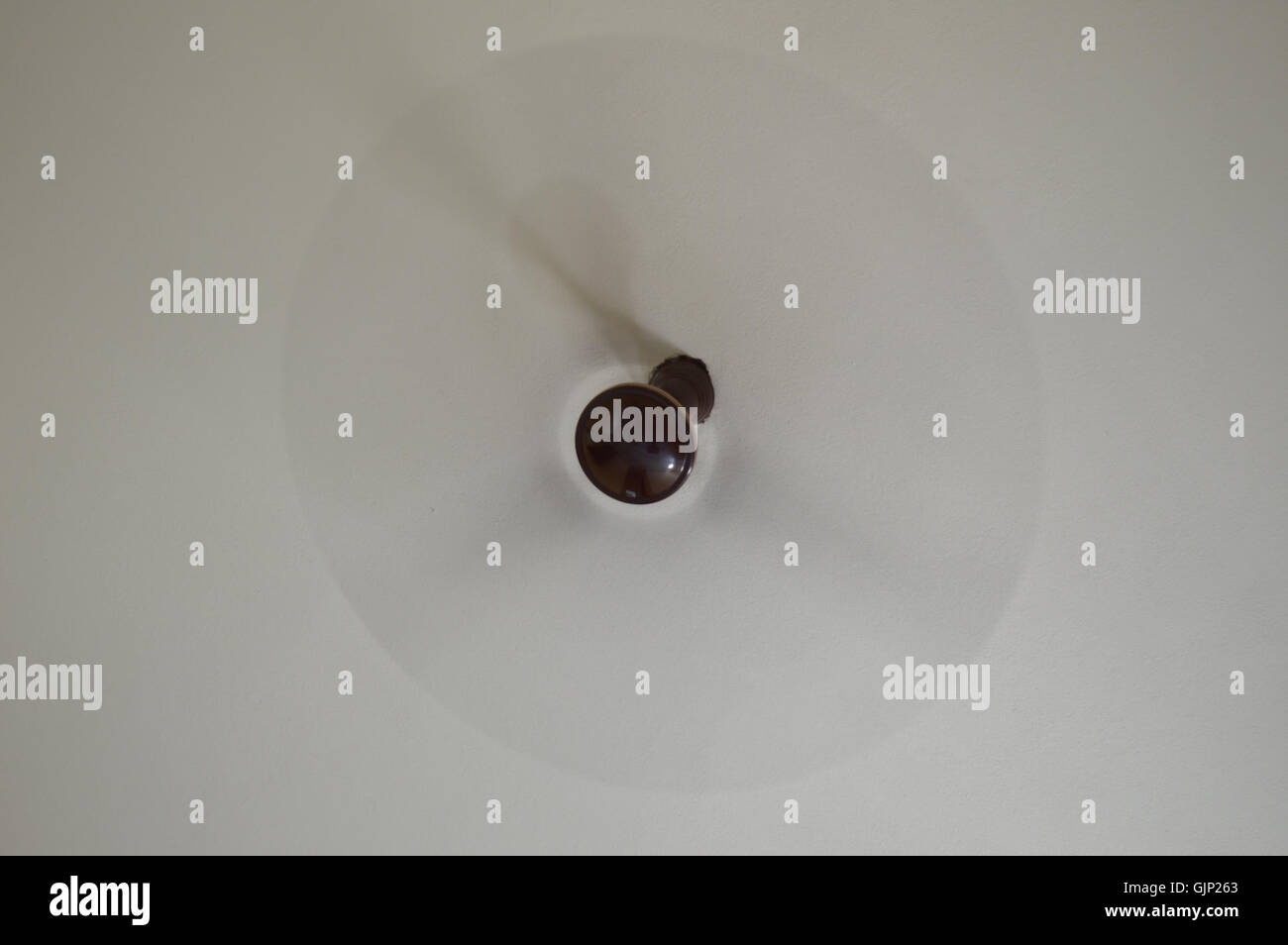 Photograph or video capture of a rotating ceiling fan taken at 1/10th ...